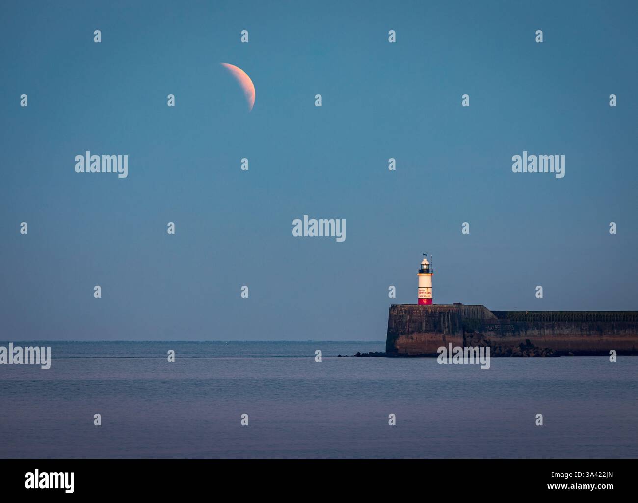 March partial moon eclipse from seaford beach over Newhaven lighthouse ...