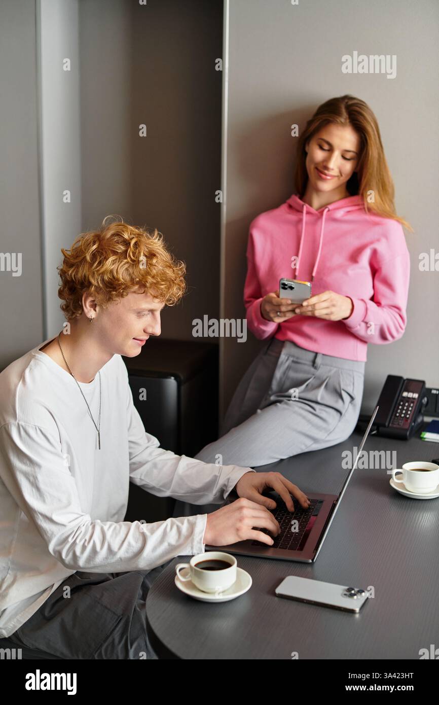 A loving young couple shares a relaxed moment at a hotel, bonding over ...