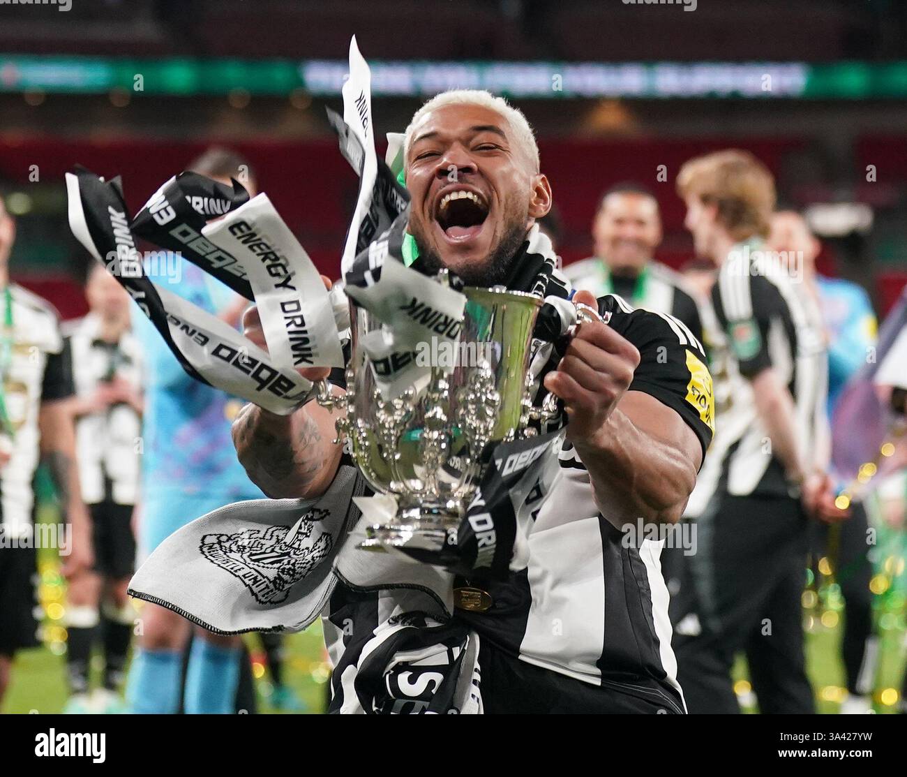 Newcastle United's Joelinton celebrates with the trophy after winning ...