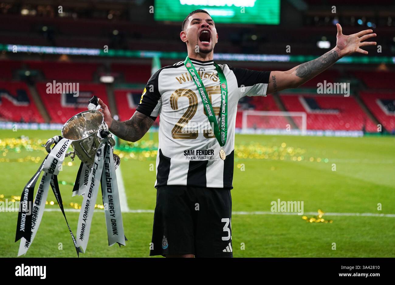 Newcastle United's Bruno Guimaraes celebrates with the trophy after ...