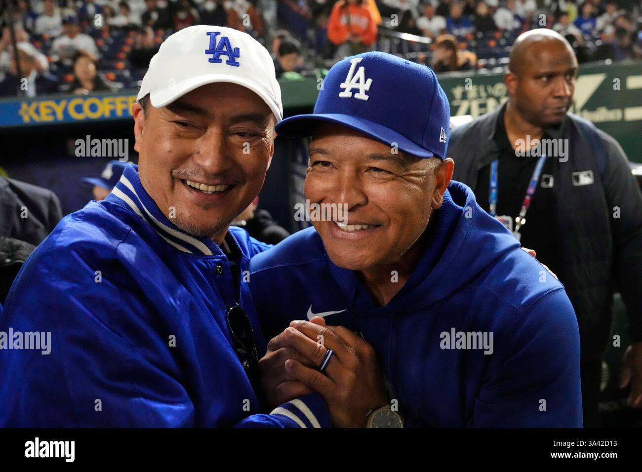 Actor Ken Watanabe, left, poses for a photo with Los Angeles Dodgers ...