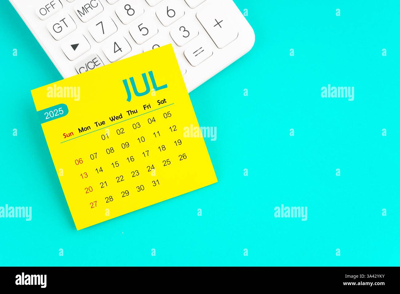 July 2025 calendar page with calculator on blue color background Stock ...