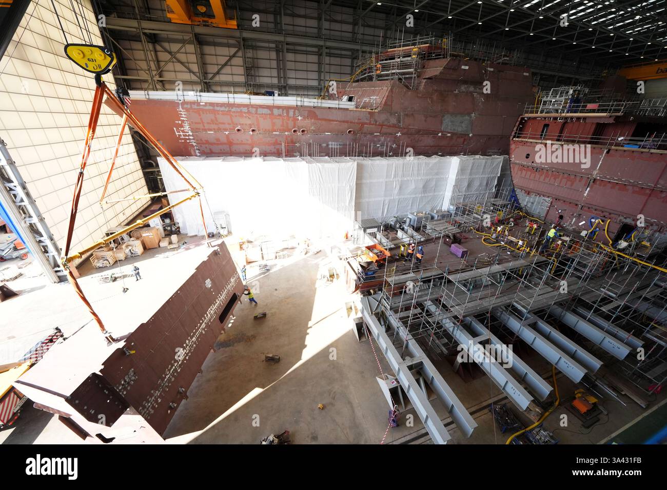 Work continues on HMS Venturer (back) and HMS Active (front) in the ...