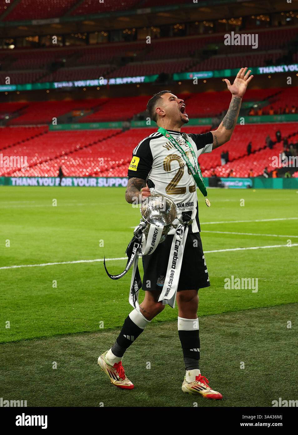 Bruno Guimaraes of Newcastle United celebrates with the Carabao Cup ...
