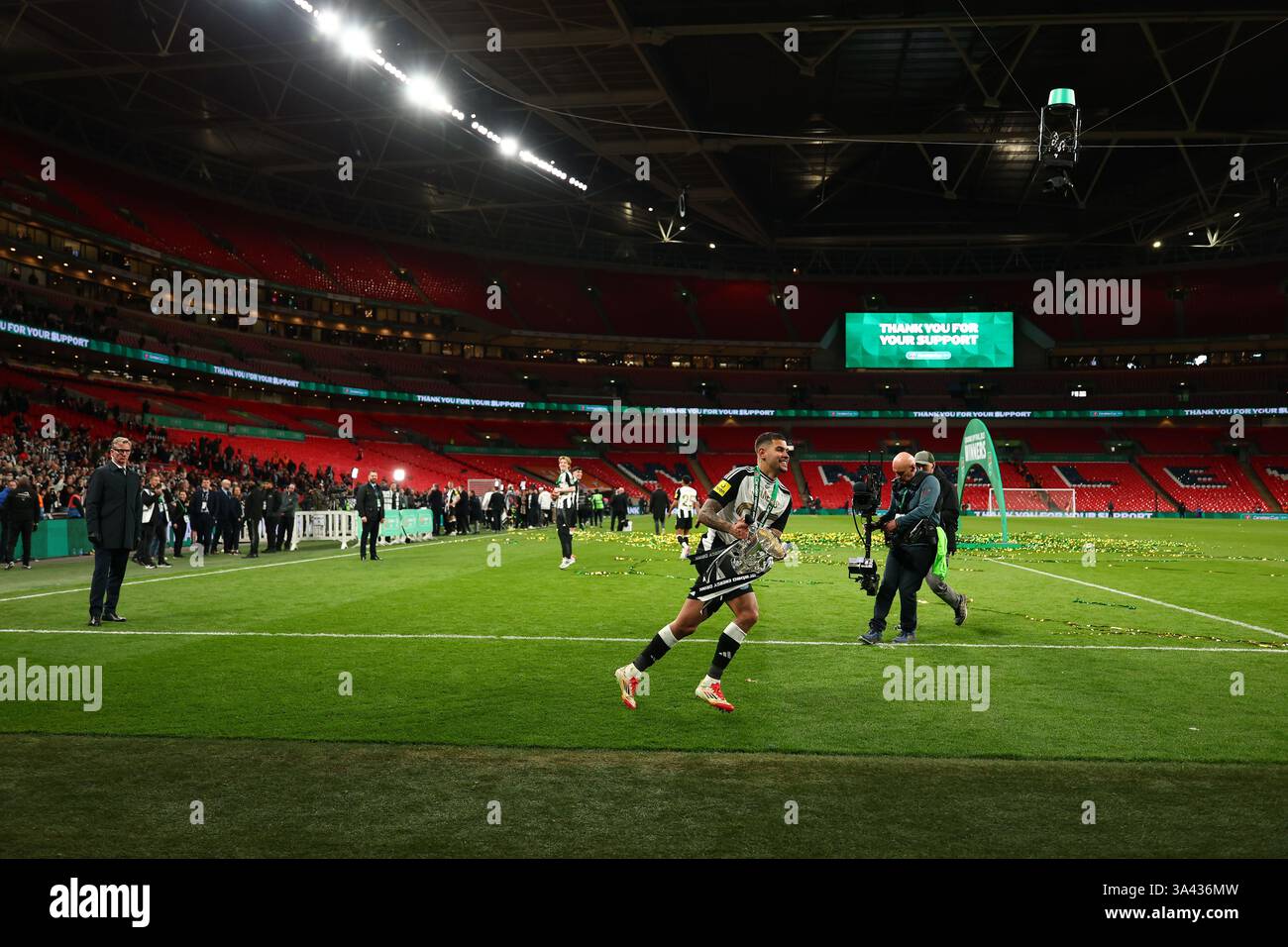 Bruno Guimaraes of Newcastle United celebrates with the Carabao Cup ...