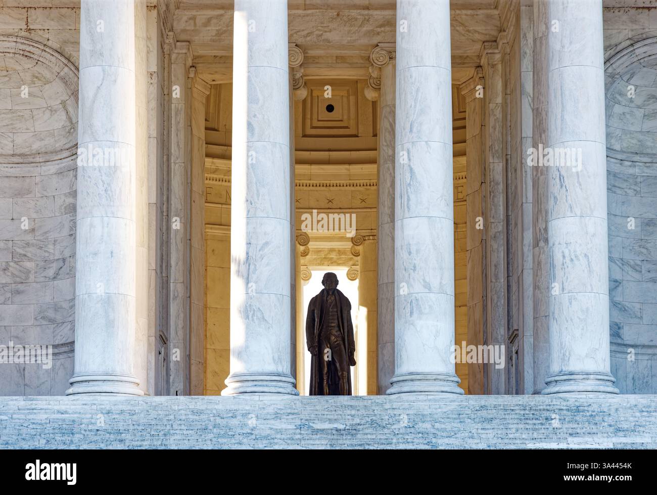 Ionic columns frame the 19-foot-tall bronze statue of Thomas Jefferson ...