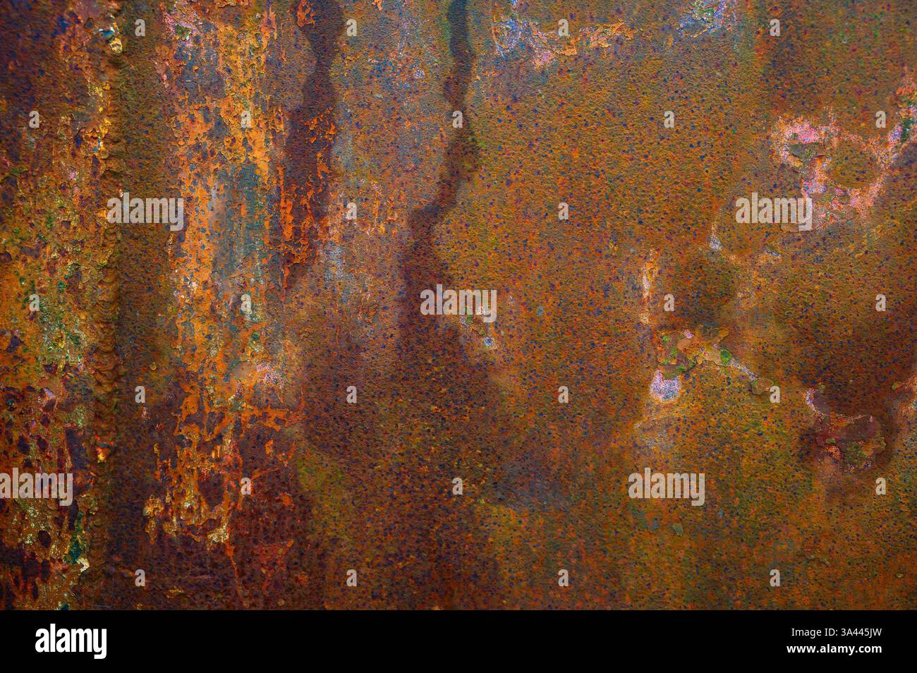 Rusted metal sheet, showing corrosion and markings from weather and ...