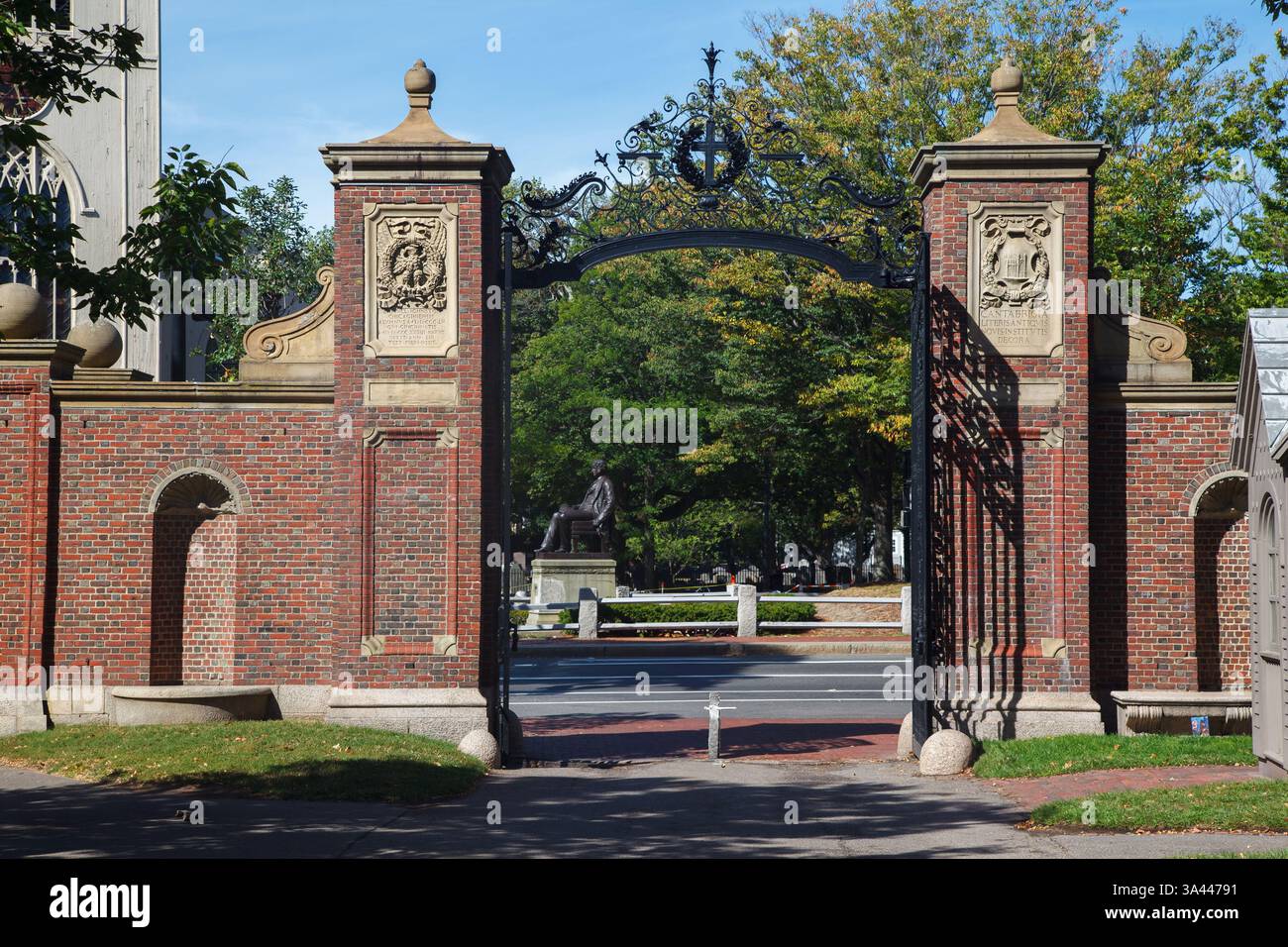 The Ornate historical brick gate of Harvard University in Cambridge ...