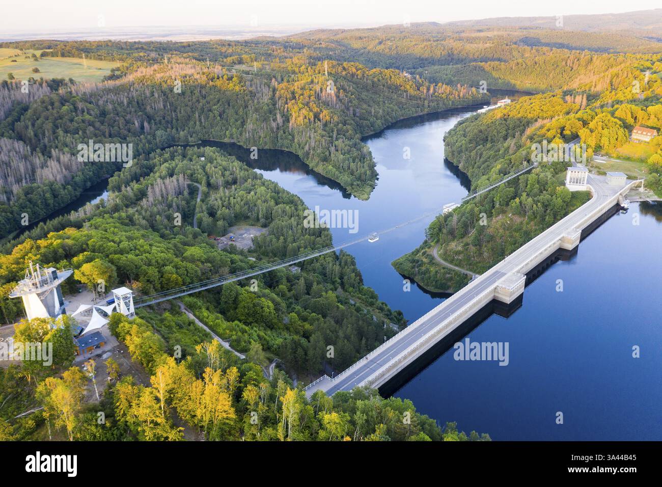 Aerial view of the Rappbode dam, dam wall and suspension bridge by ...
