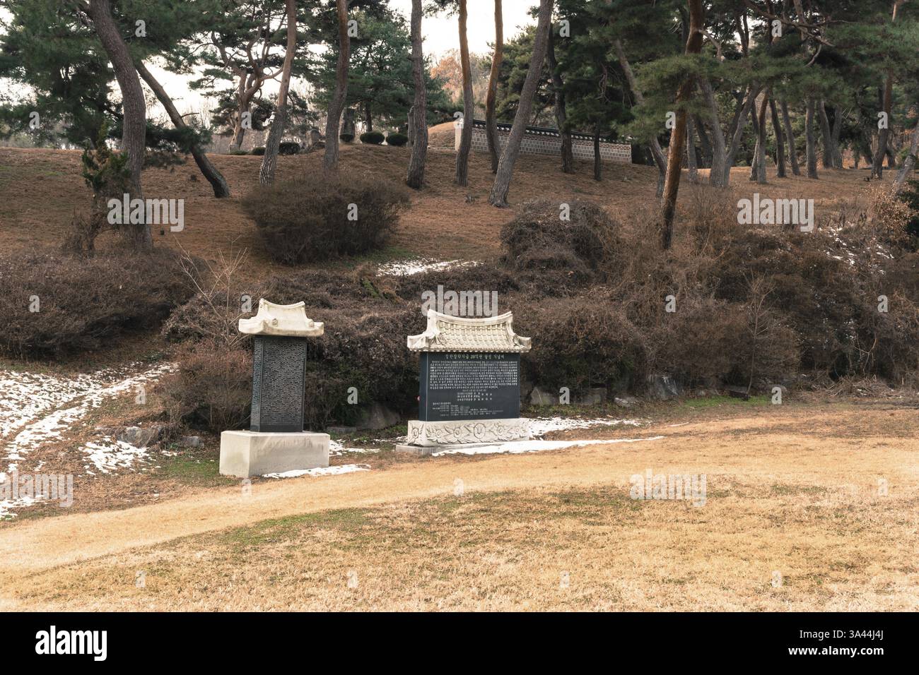 Chungju, South Korea, December 18, 2018: Burial mound surrounded by ...