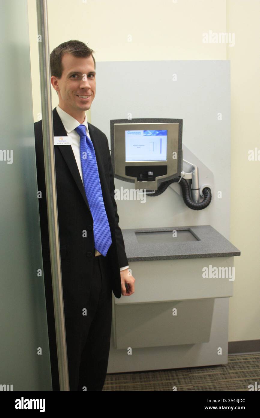 June 11, 2014 - Atlanta, GA, USA - Joshua Yager, a SunTrust branch ...