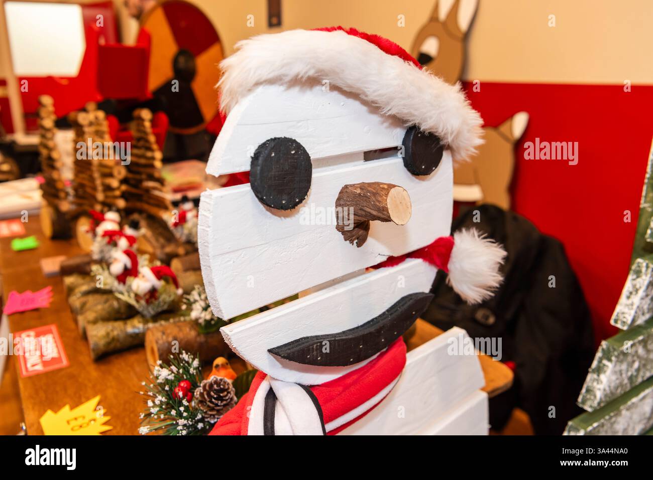 Wooden snowman made from recycled pallet wood at a Christmas market ...
