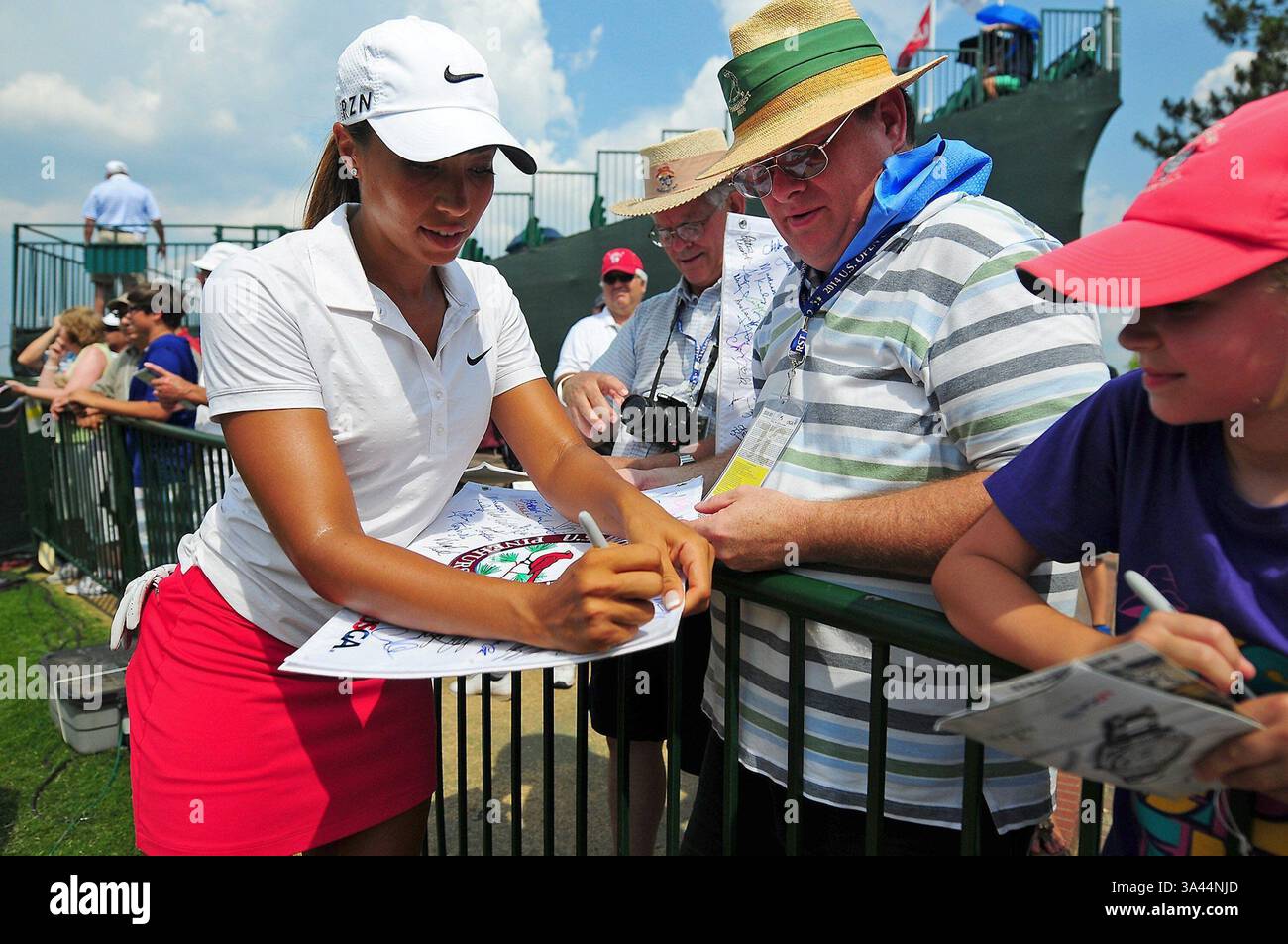 June 18, 2014 - Pinehurst, NC, USA - Cheyenne Woods stops to sign ...