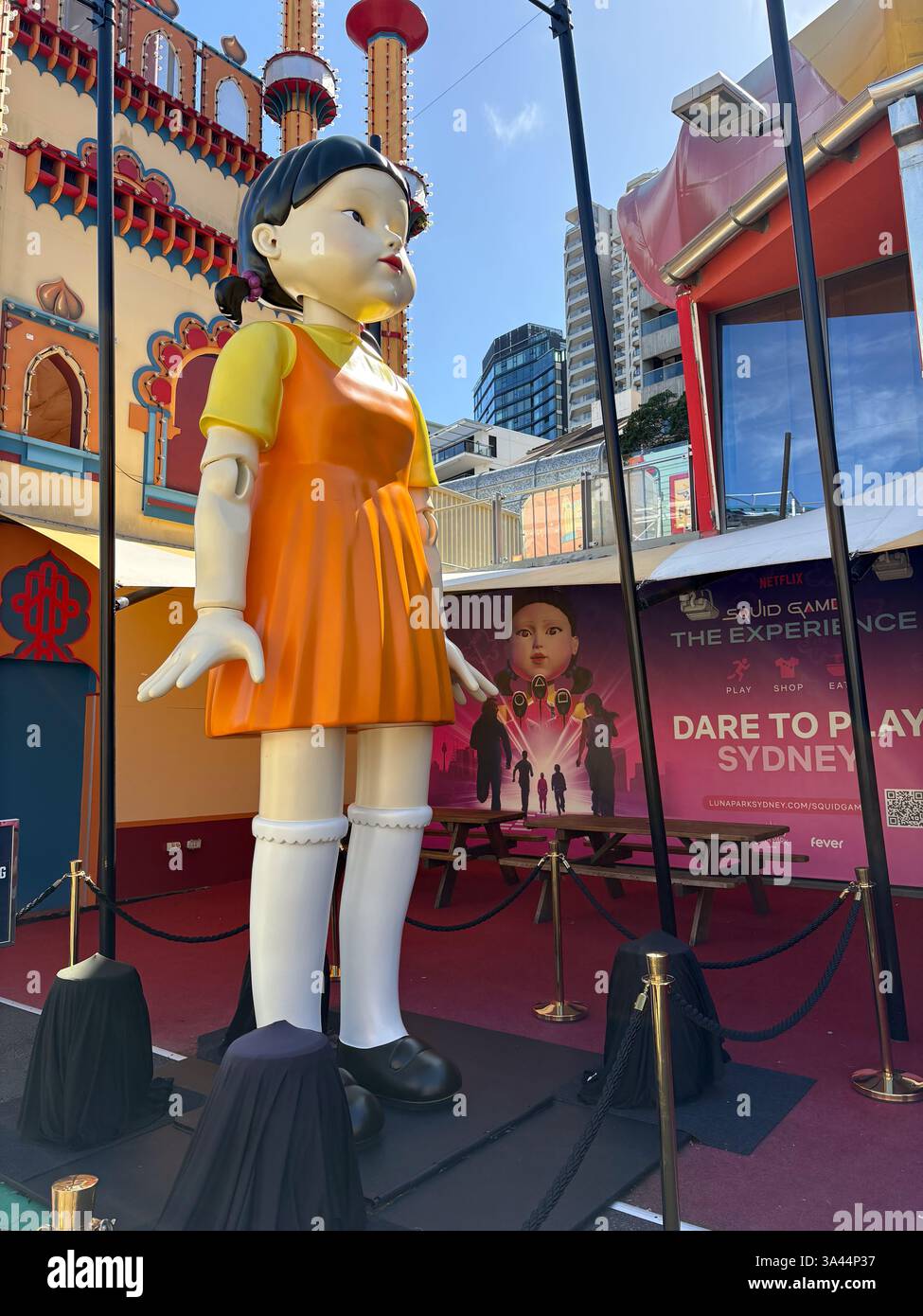 Squid game doll in front of Luna Park in Sydney, Australia with "dare ...