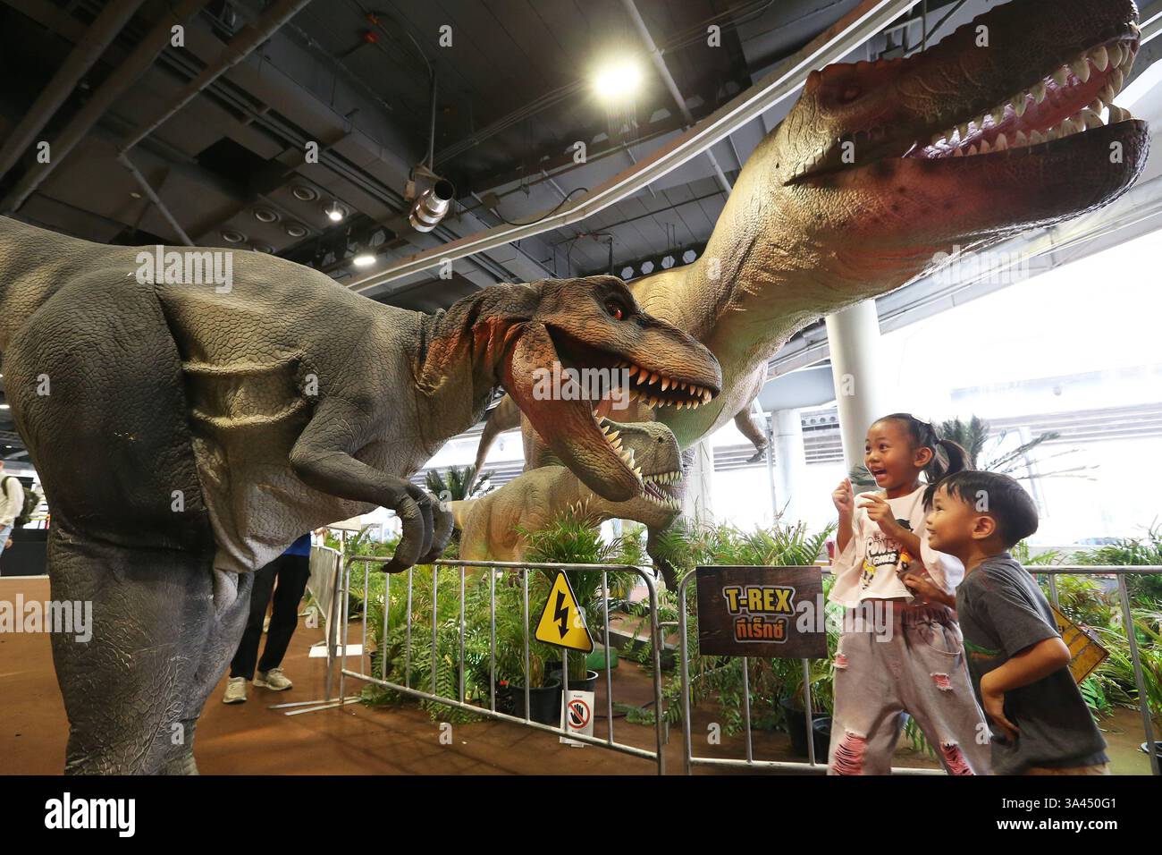 Bangkok. 18th Mar, 2025. Children visit a dinosaur exhibition in MBK center shopping mall in ...