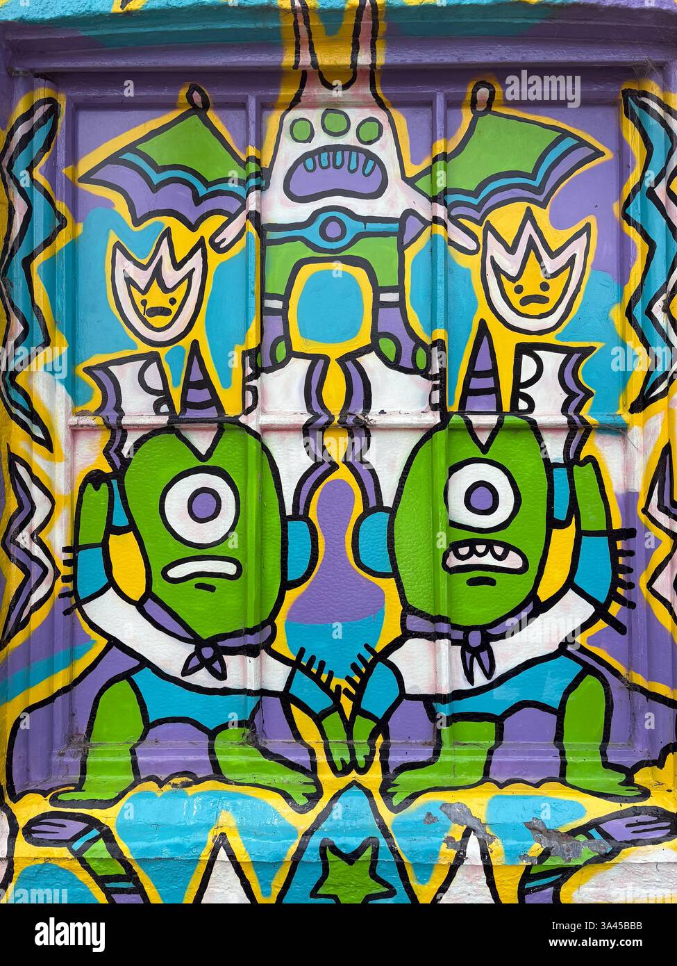 Colorful and whimsical monster mural, showcasing cartoon-like figures ...