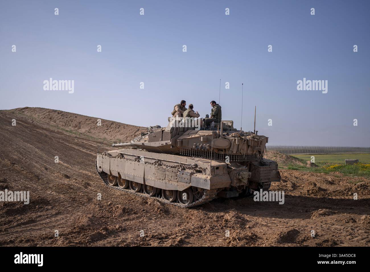 18 March 2025, ---: Israeli tanks are seen on the border between Israel ...