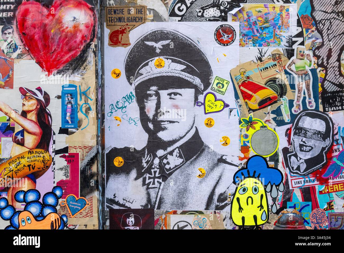 18/03/2025. London, UK .Street art in Brick Lane by artist Grow Up Art ...