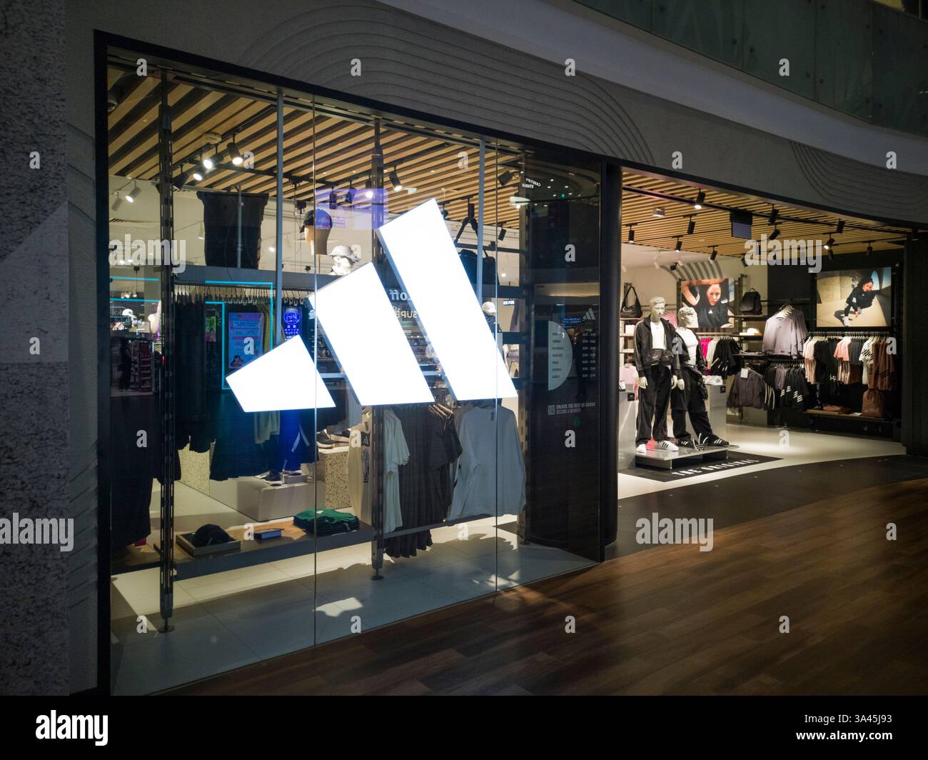 Singapore – Mar 13, 2025: Brand ADIDAS with a storefront features a ...