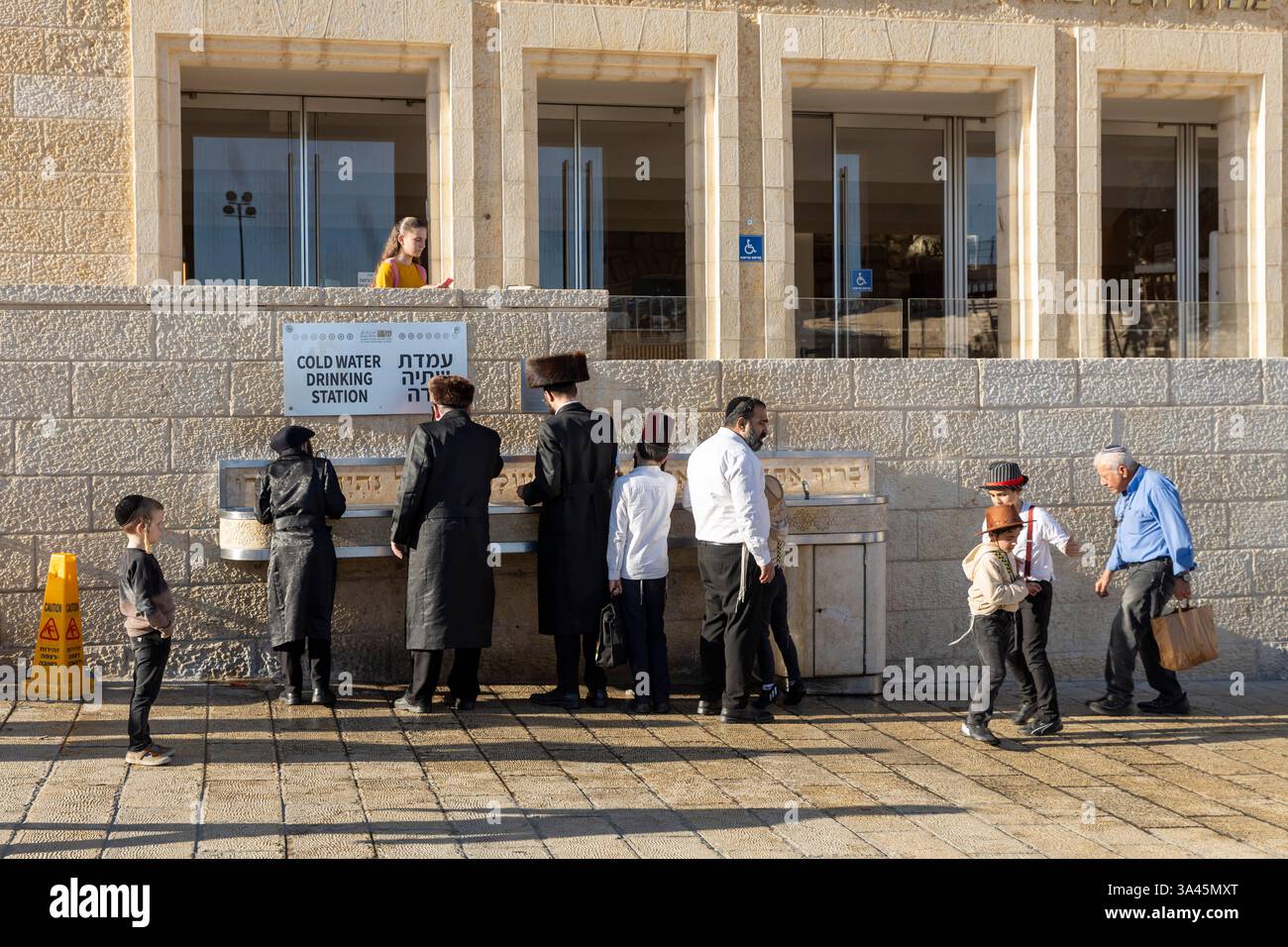 Jerusalem, Israel, March 16, 2025, Orthodox Hasidim or Haredim stand ...