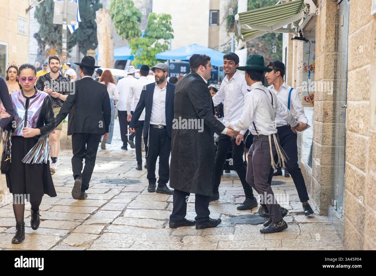 Jerusalem, Israel, March 16, 2025, Purim in the city. Young Haredi men ...