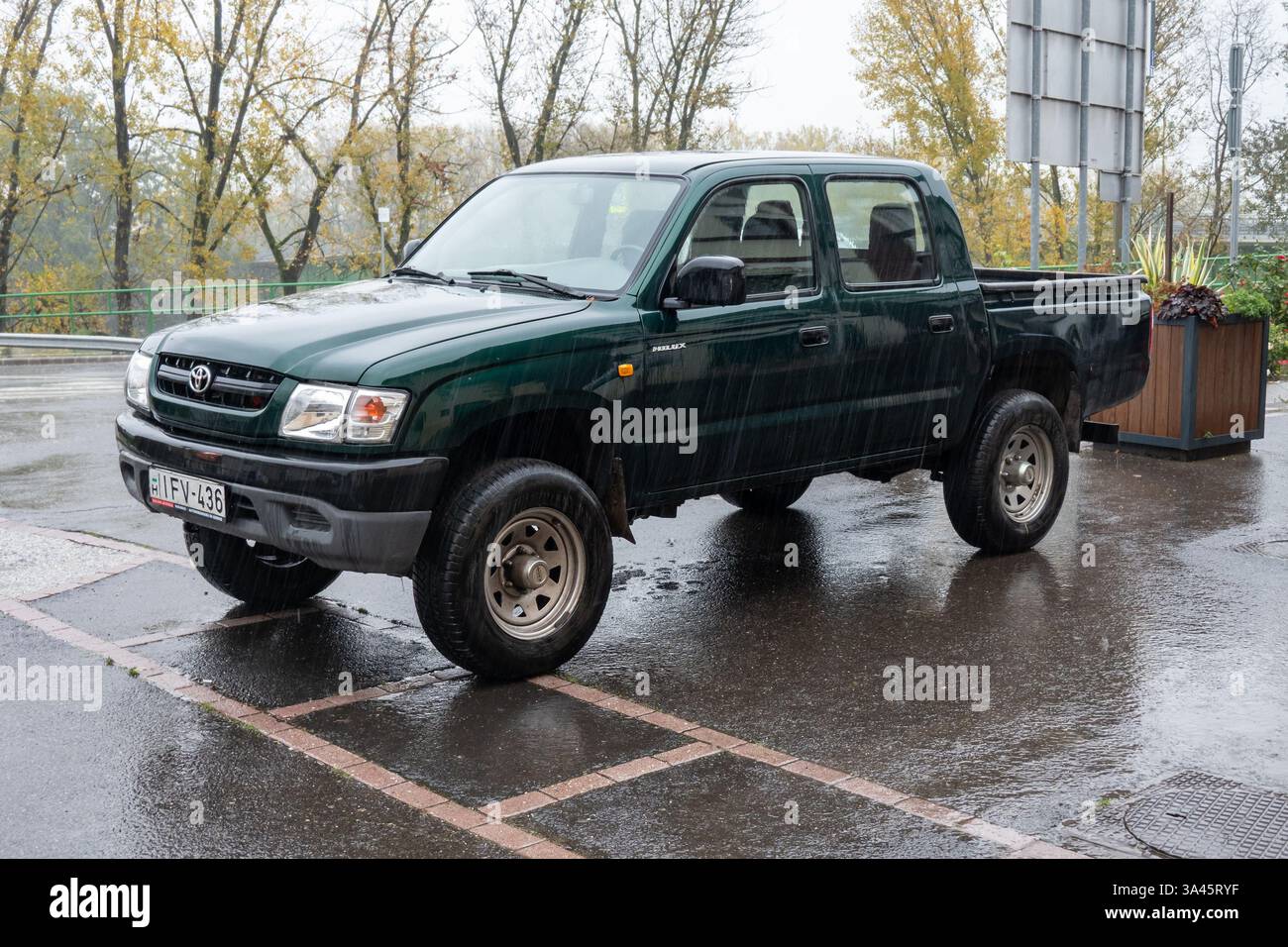 TOKAJ, HUNGARY - OCTOBER 27, 2023: Green legendary Toyota Hilux VI 4WD ...