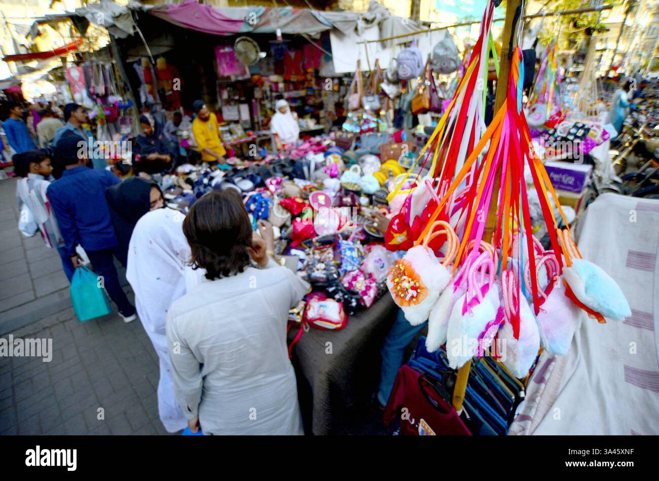 People are busy in Eid shopping ahead of Eid-ul-Fitar during the Holy ...