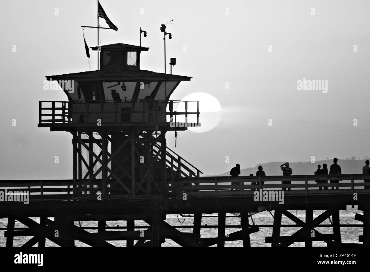 Sunset lifeguard tower Black and White Stock Photos & Images - Alamy