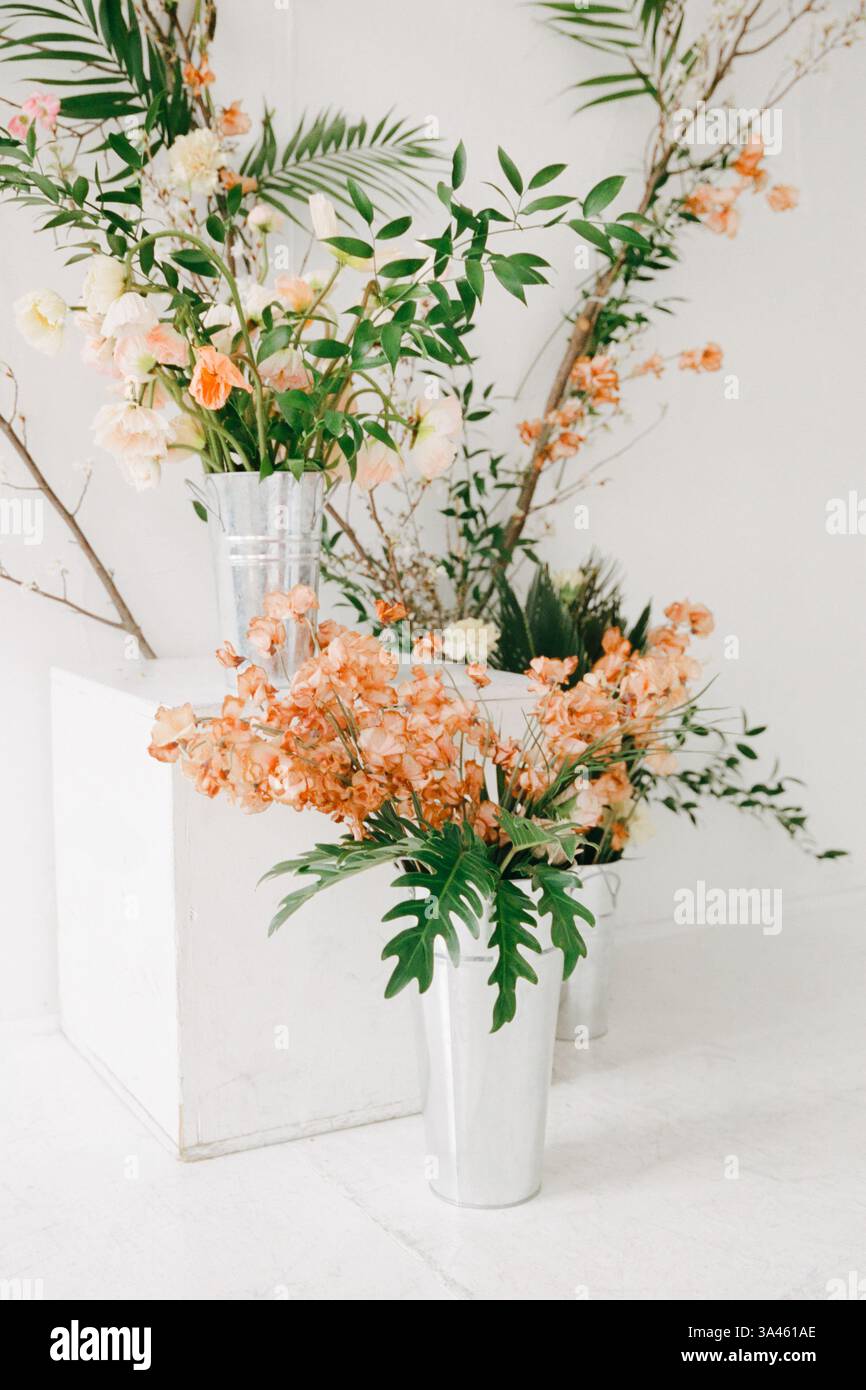 A collection of delicate flower arrangements featuring pastel blooms ...