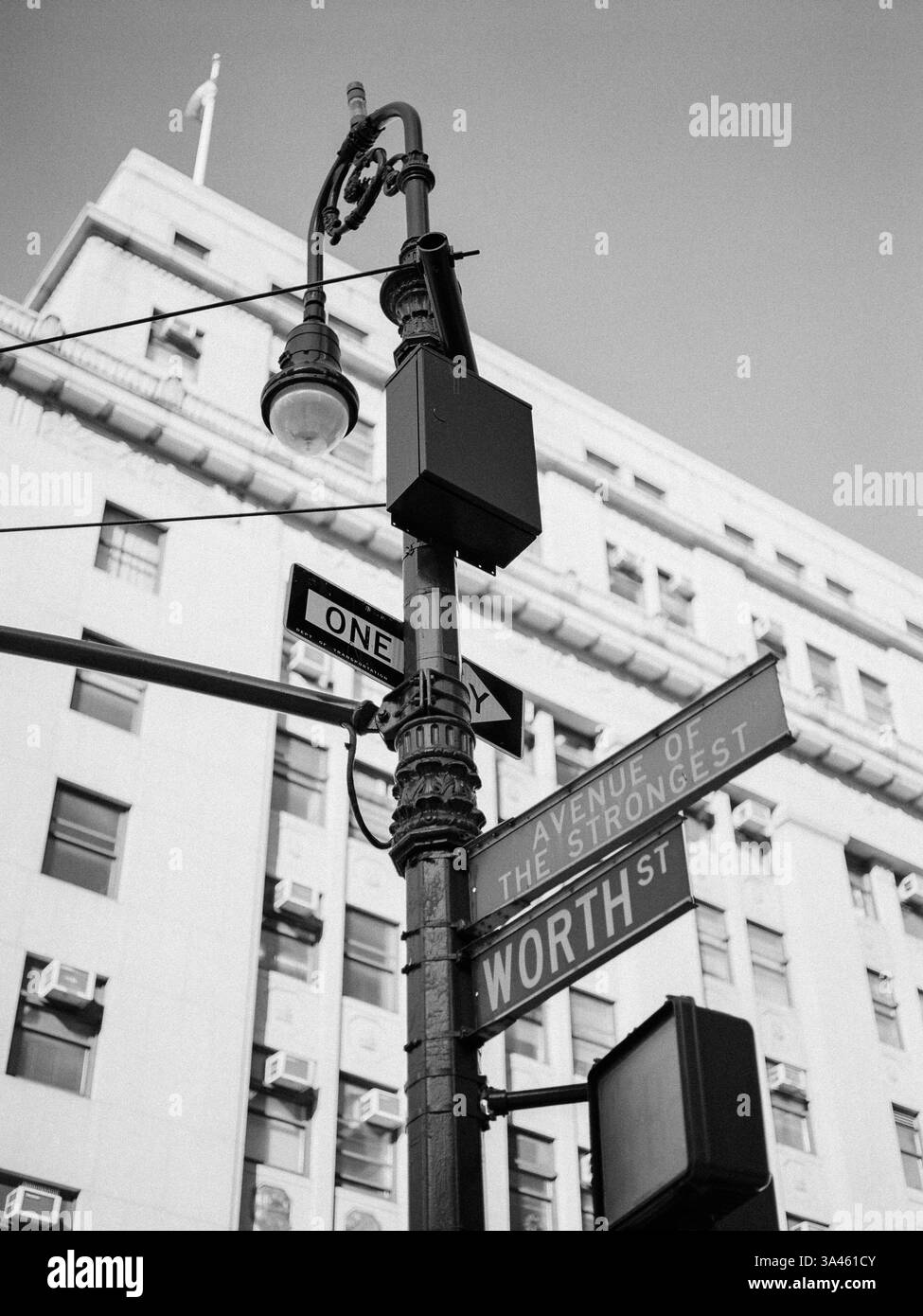 Street signs highlight Worth Street and Avenue of the Strongest, set ...
