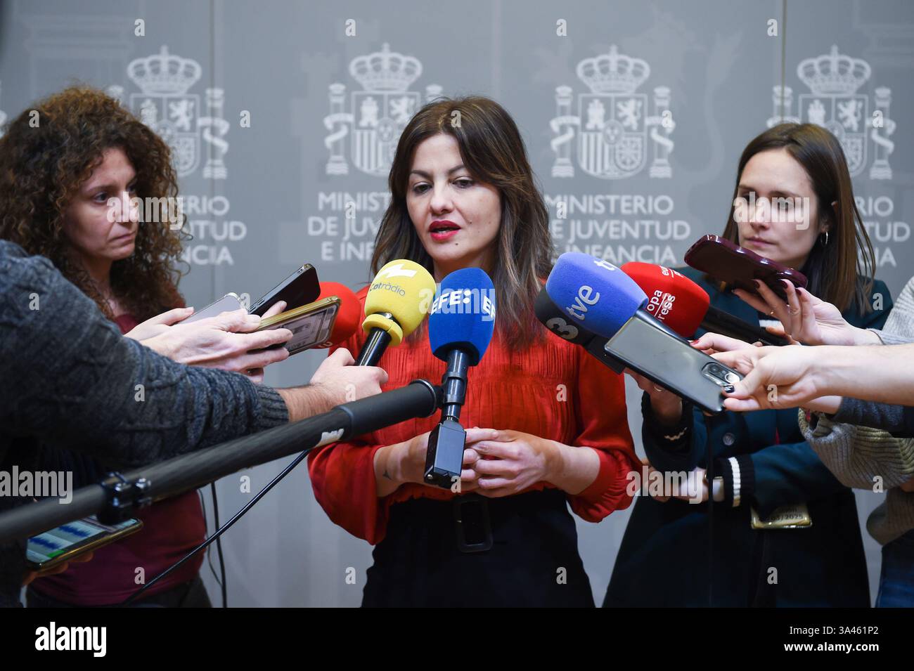 The Minister of Youth and Childhood, Sira Rego (c), attends to the ...