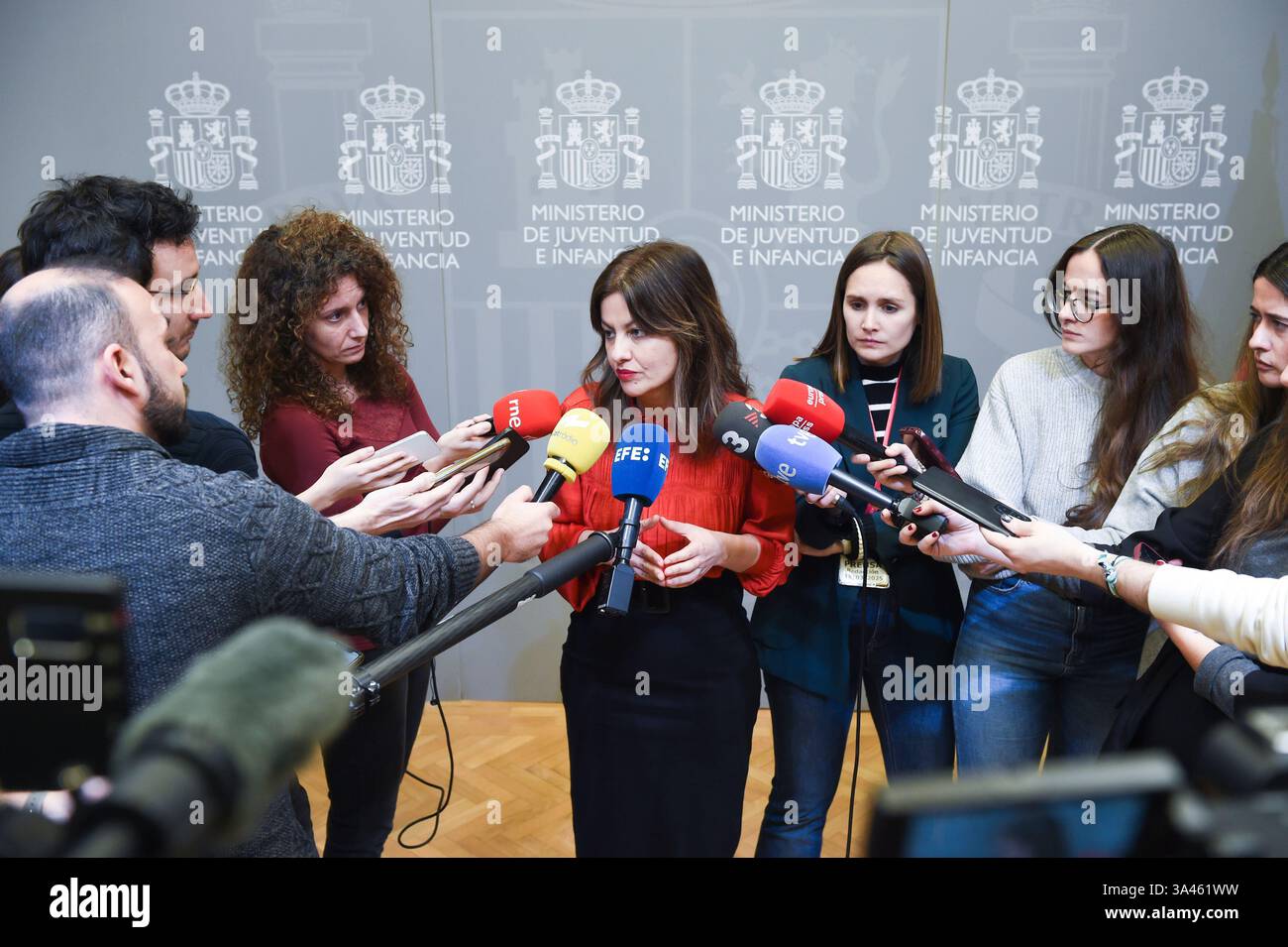 The Minister of Youth and Childhood, Sira Rego (c), attends to the ...