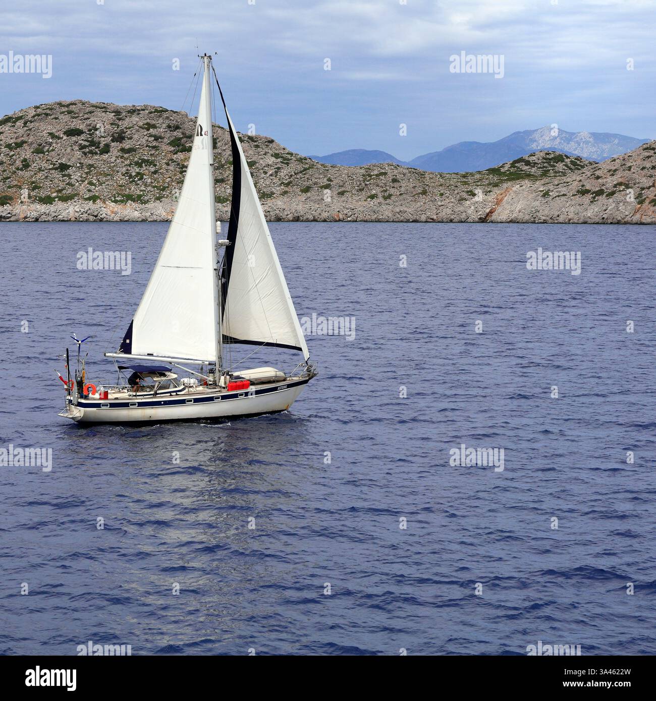 Yacht on full sail just off Symi island, Dodecanese Island Group ...