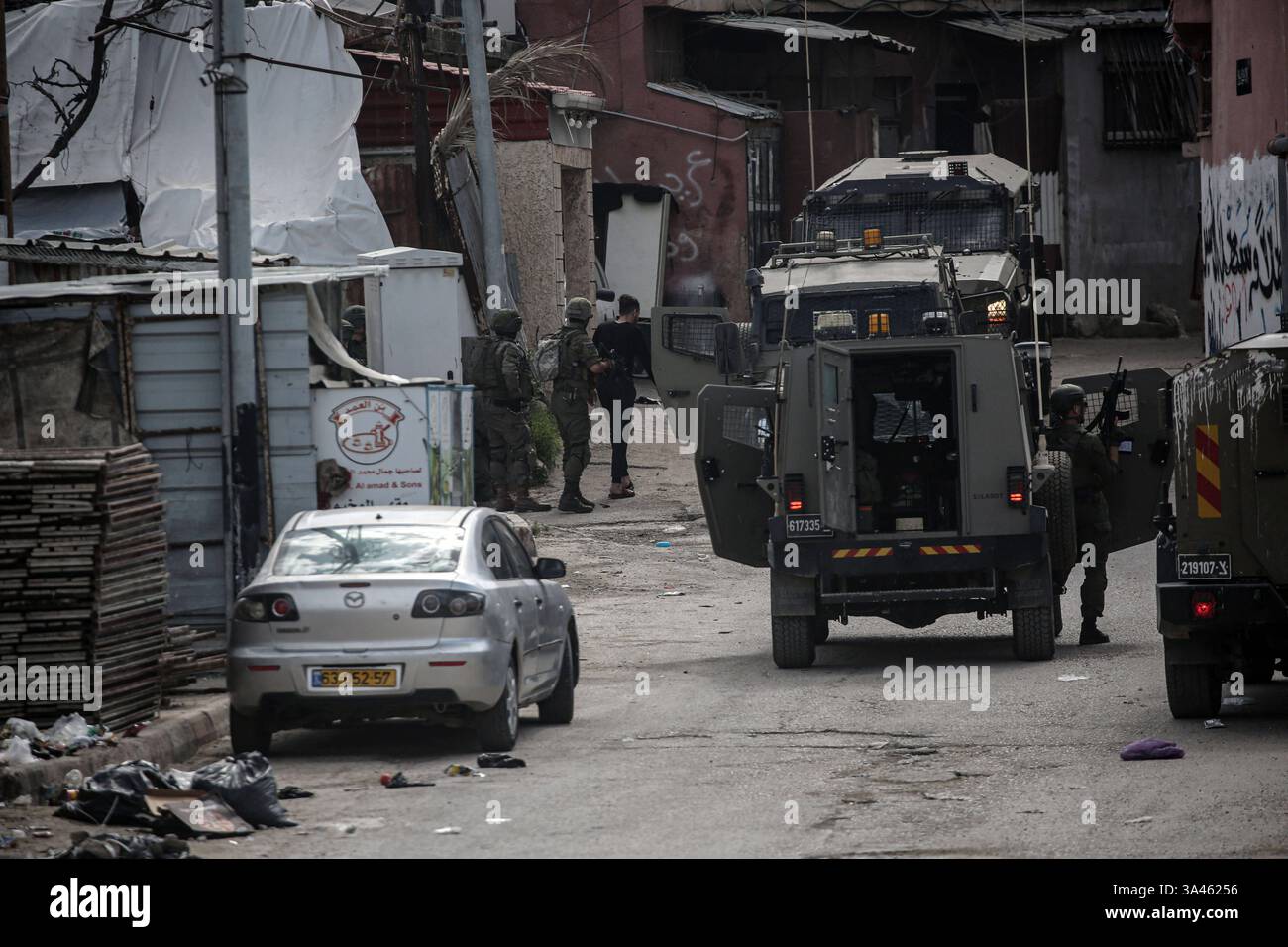 Israeli occupation forces arrest Palestinian citizens during a raid on ...