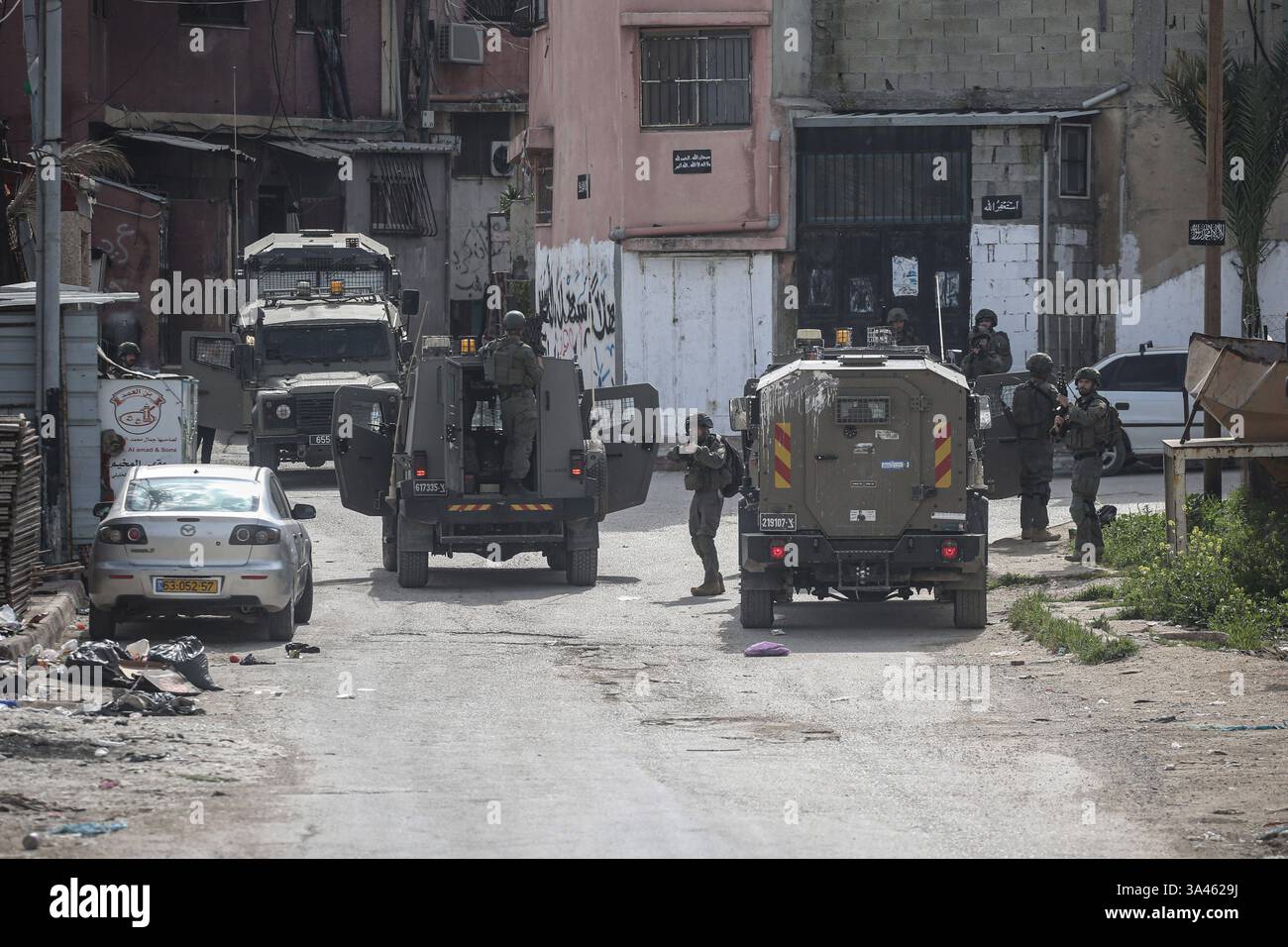 Israeli occupation forces arrest Palestinian citizens during a raid on ...