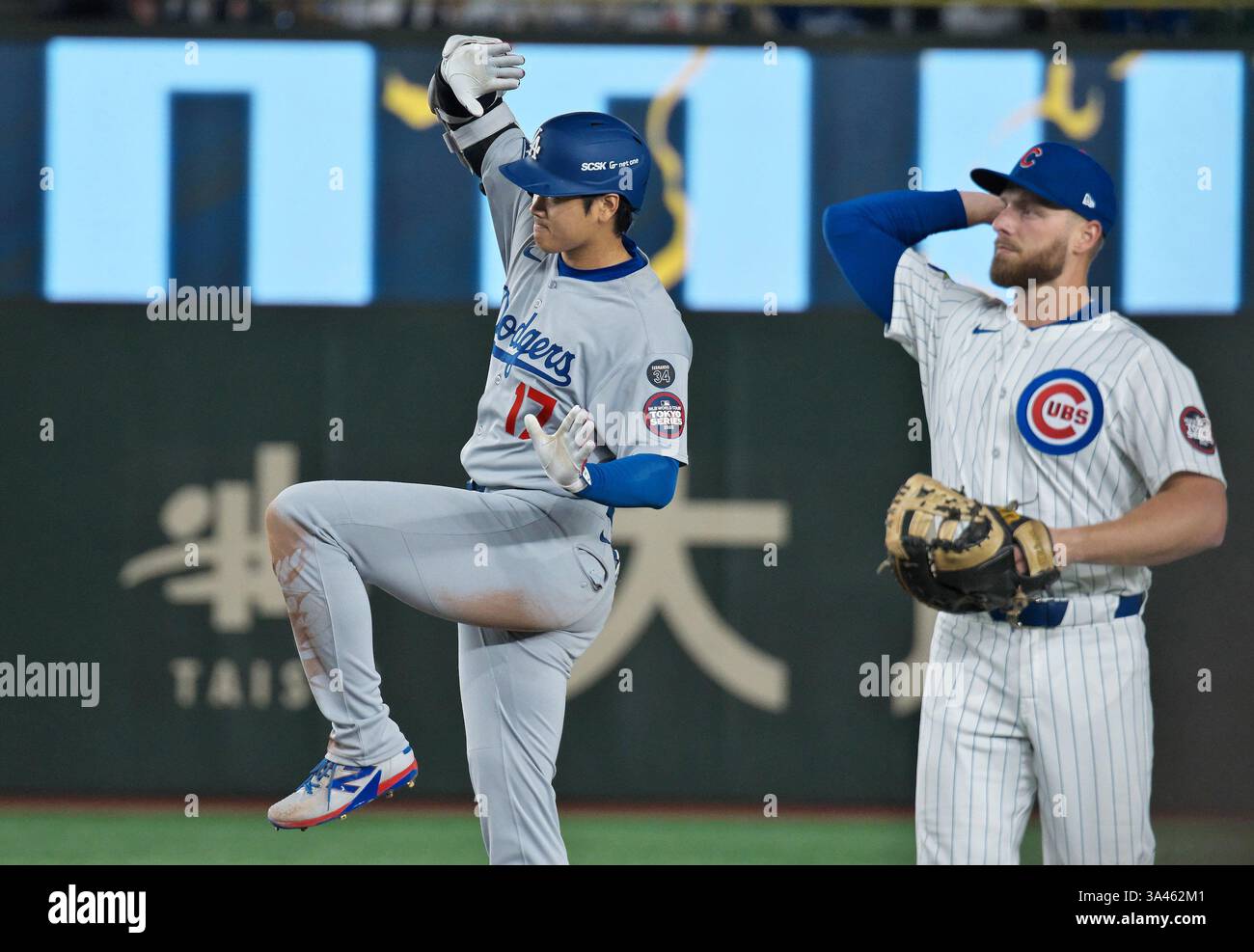Tokyo, Japan. 18th Mar, 2025. Los Angeles Dodgers Shohei Ohtani reacts ...