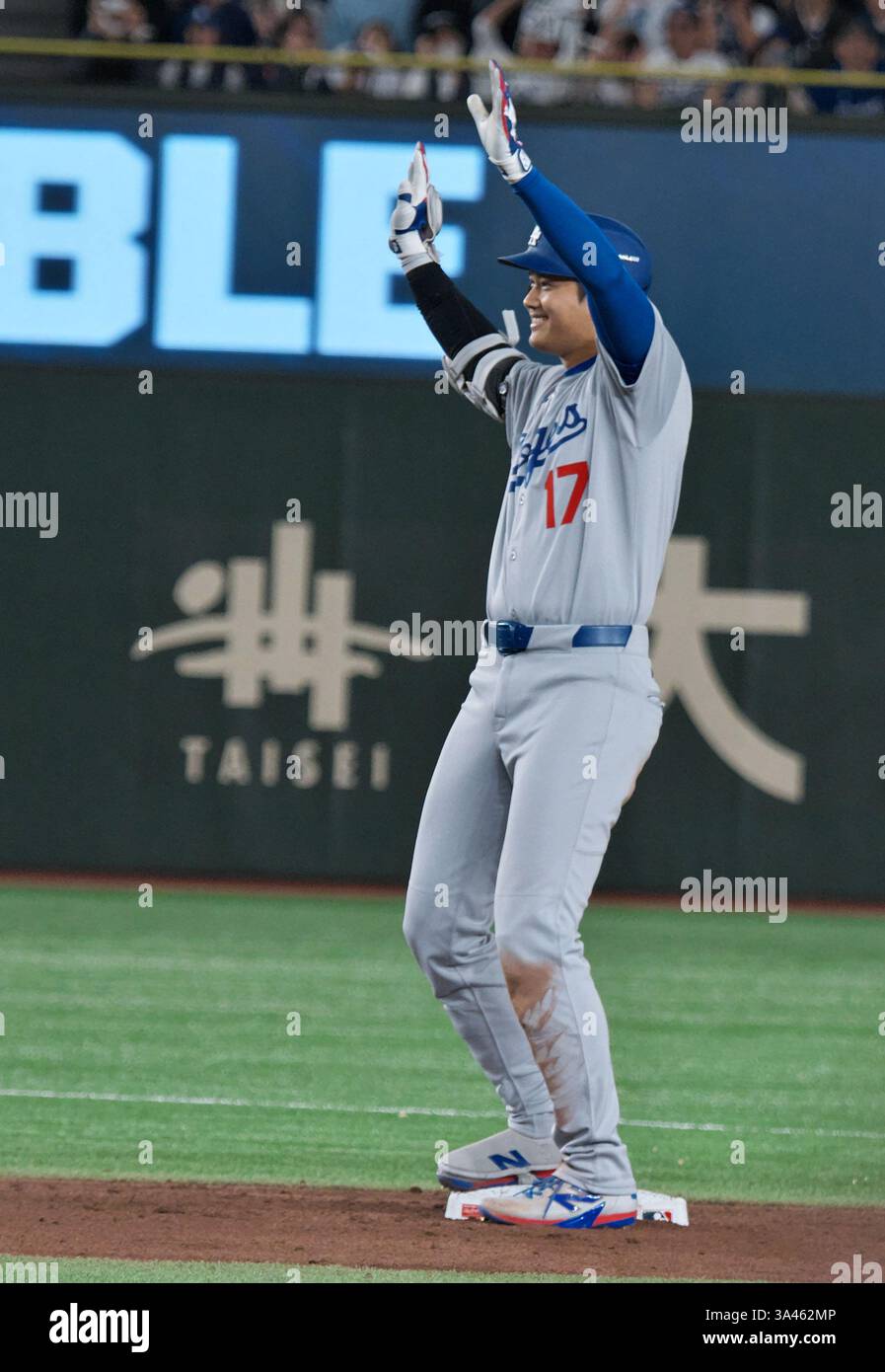 Tokyo, Japan. 18th Mar, 2025. Los Angeles Dodgers Shohei Ohtani reacts ...