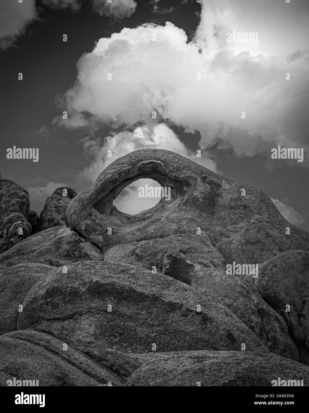 An arch formation in the boulders and geological formations of the ...