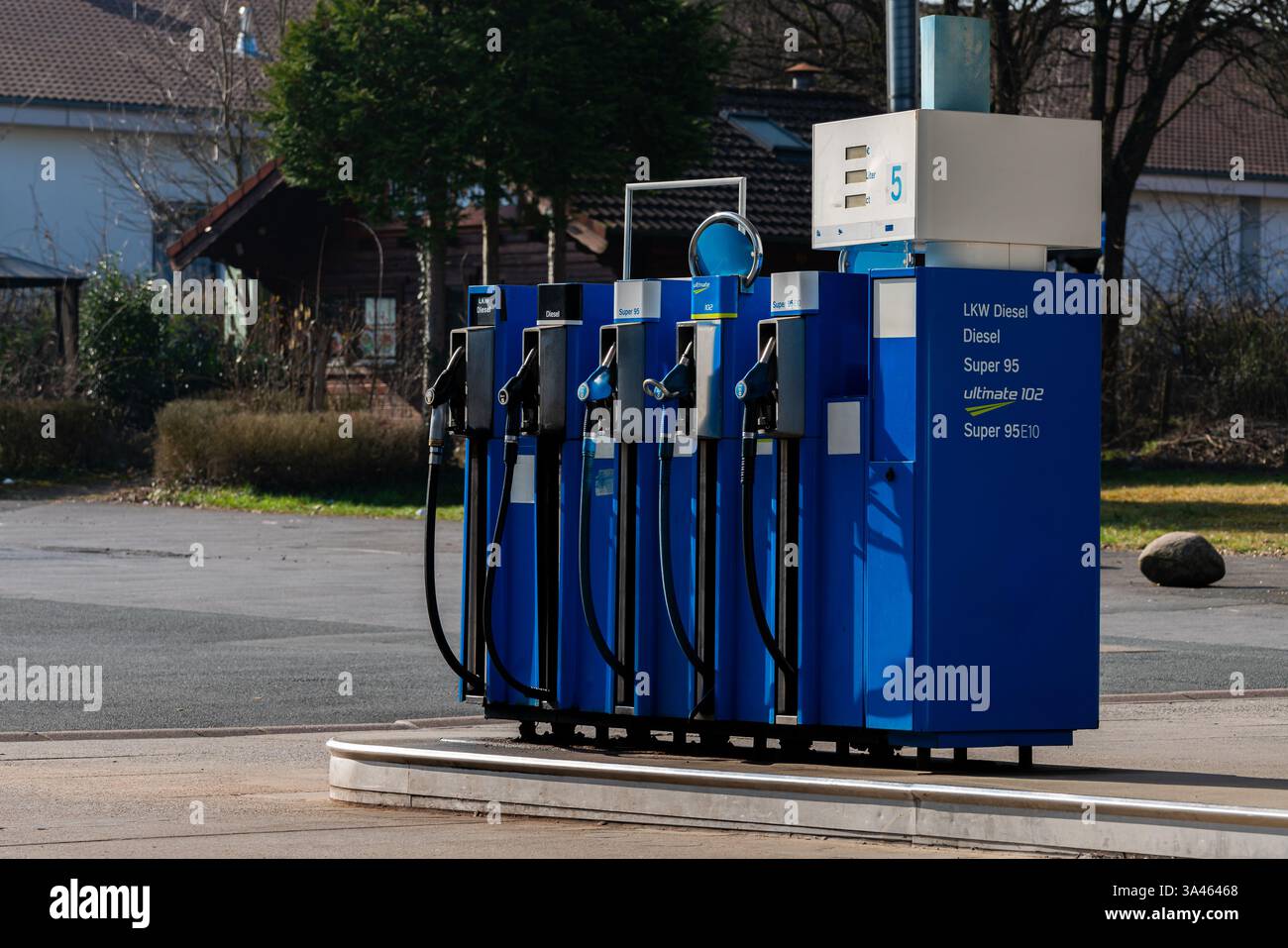 A modern fuel pump station features various fuel options including ...