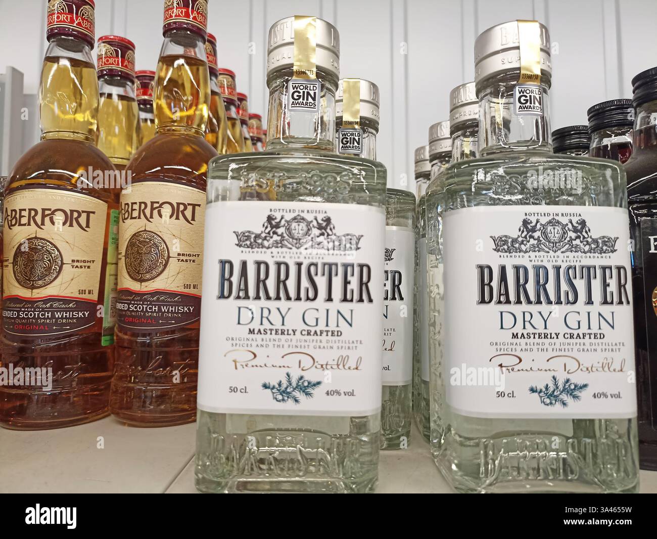 Barrister dry gin and beberfort scotch whisky bottles displayed on ...