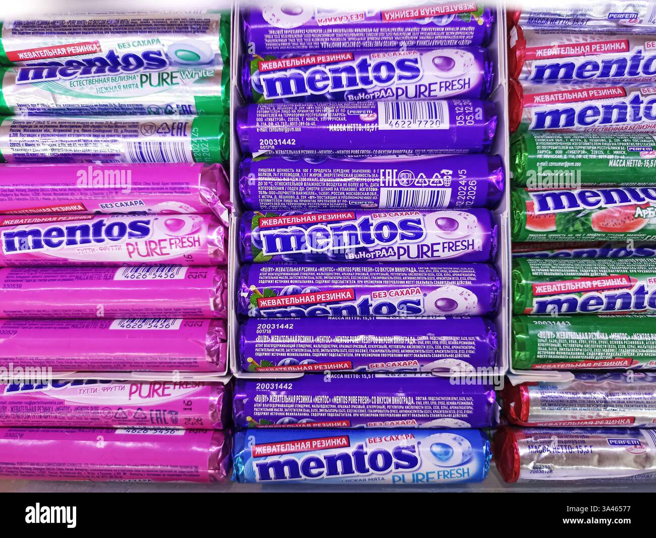 Assorted mentos gum packs in vibrant colors side view Stock Photo - Alamy