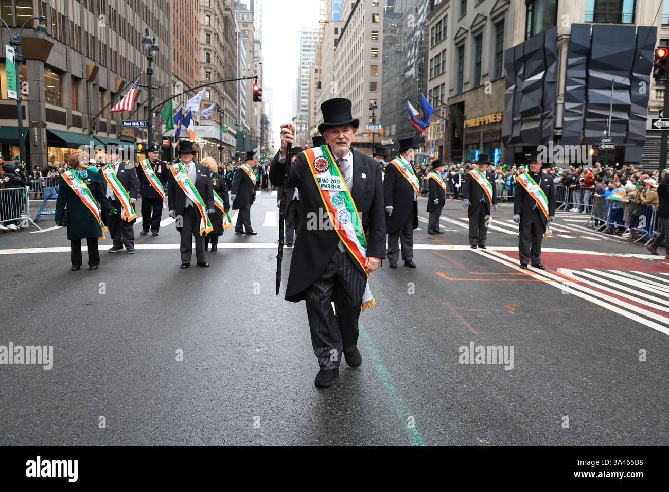 Grand Marshall Mike Benn poses for a photo during the St. Patrick's Day ...