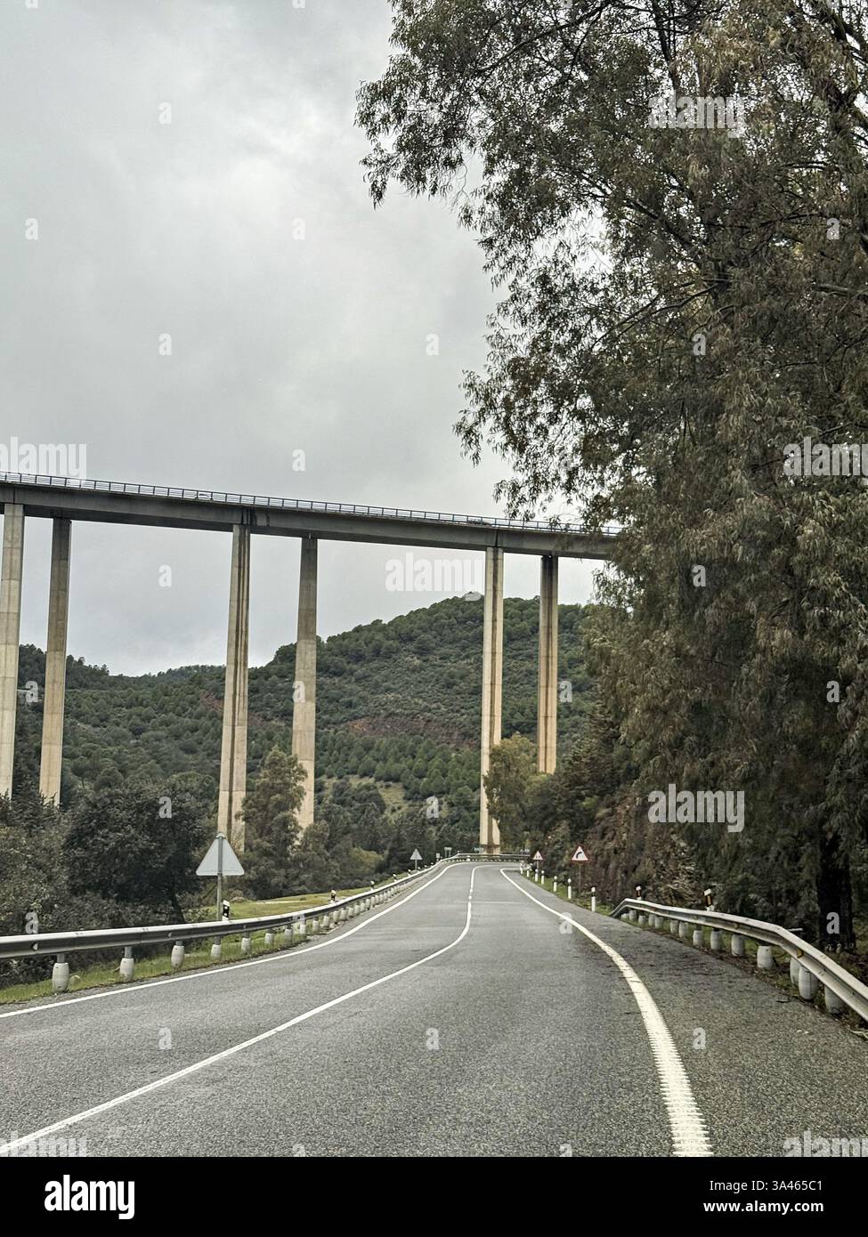 A large concrete viaduct stretches across a valley in Despenaperros ...