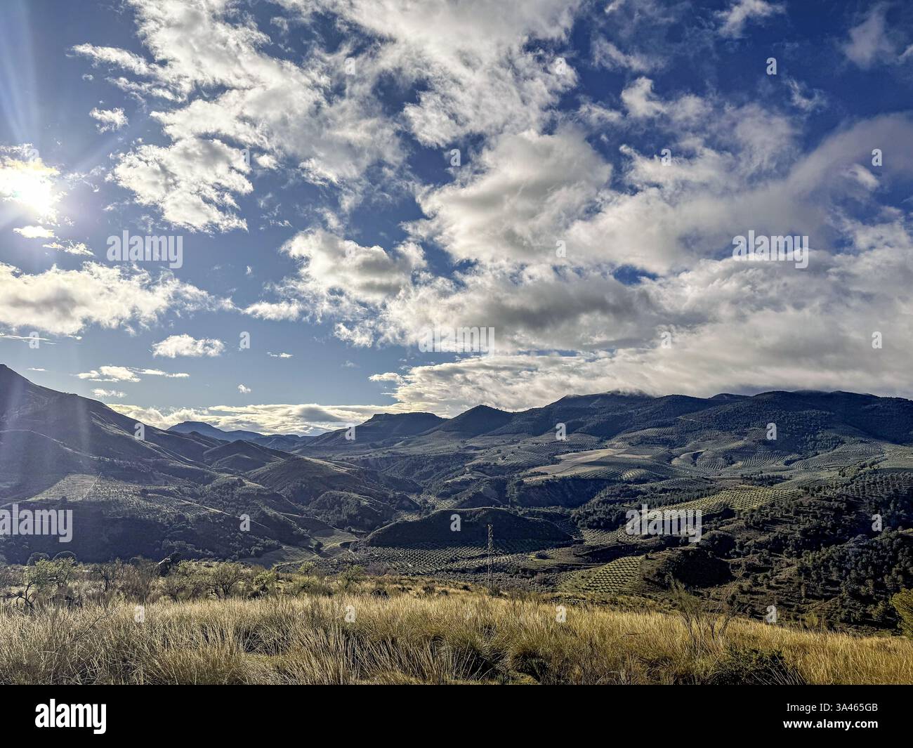 A breathtaking view of Sierra Magina, Spain, featuring mist rising over ...