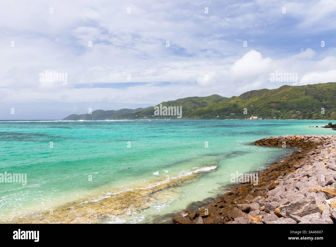 A breathtaking view of a tropical coastline with turquoise clear waters ...