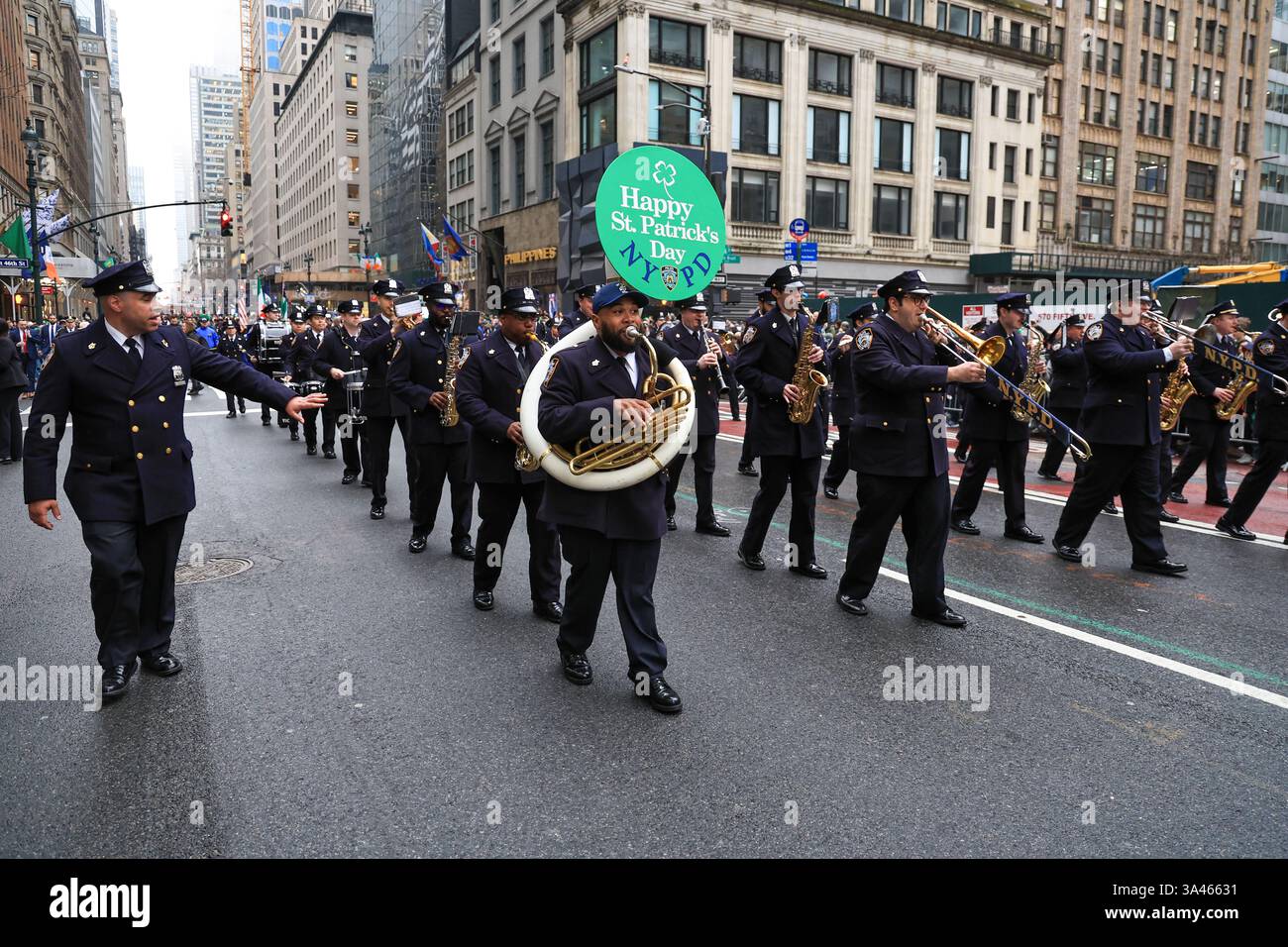 The NYPD Marching Band performs while marching during the St. Patrick's ...