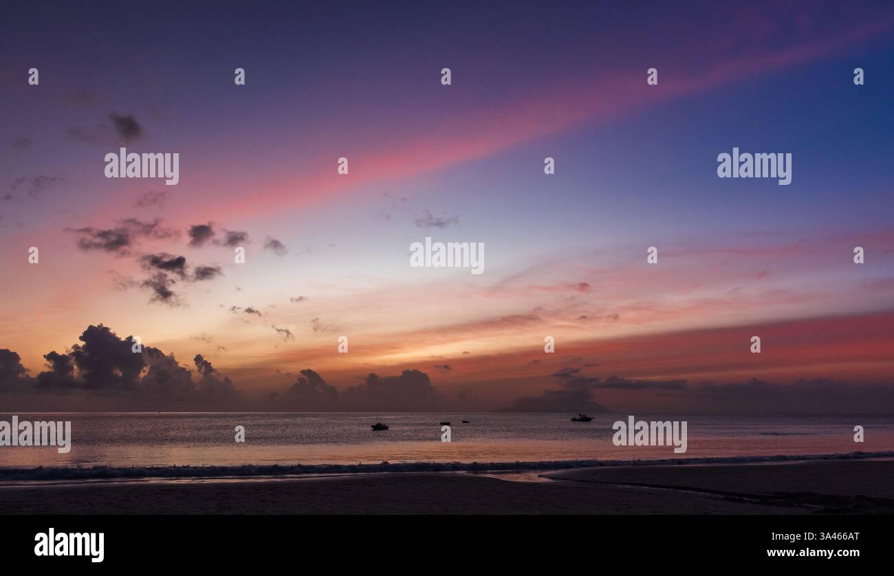 Serene sunset blending twilight ocean hi-res stock photography and ...