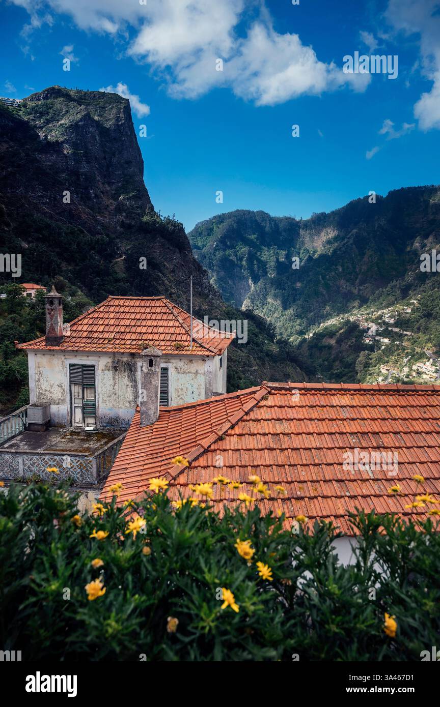 Red teraccotta roofed buildings in the valley of the Nuns, with Eira Do ...