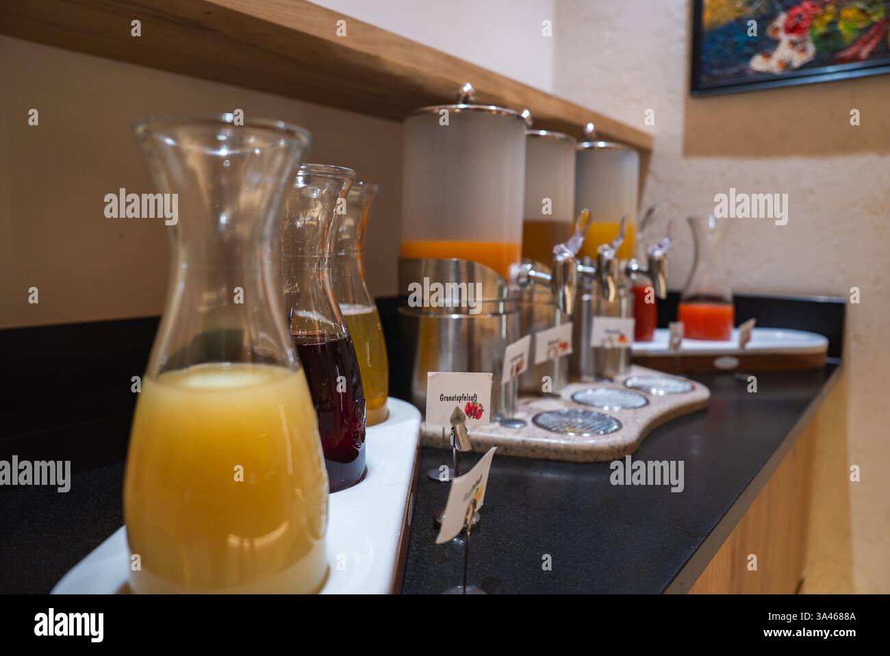 Indoor Beverage Station with Juice Carafes in Ischgl Hotel Setting ...