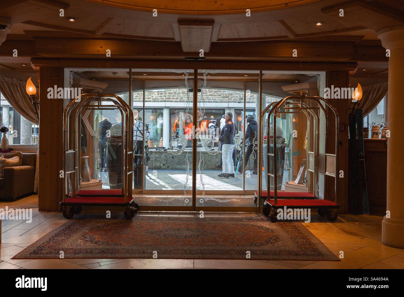 Luxury Hotel Lobby with Wooden Design and Gold Luggage Carts Stock ...